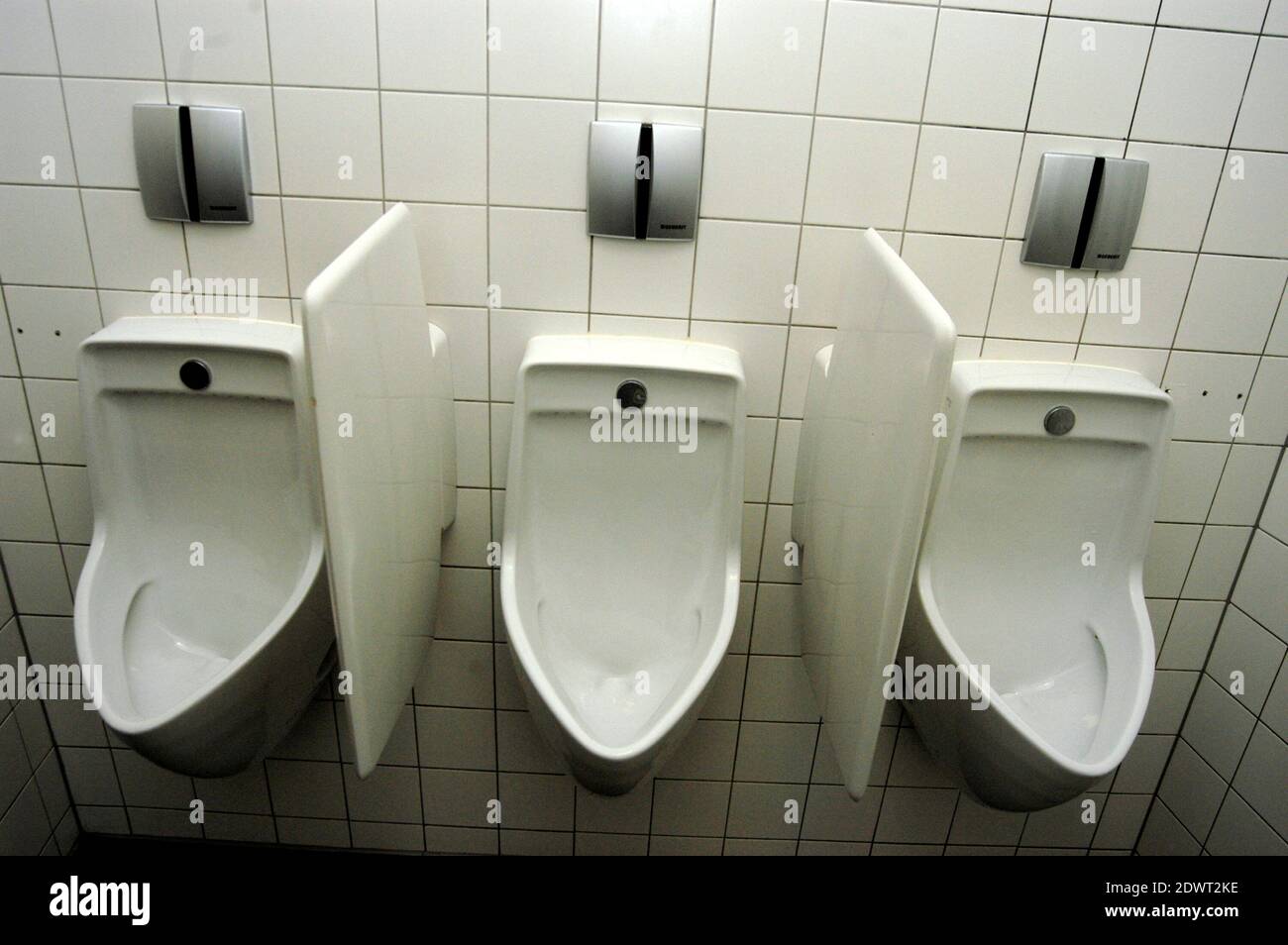 an urinal in a restroom, body hygiene and basic needs Stock Photo - Alamy