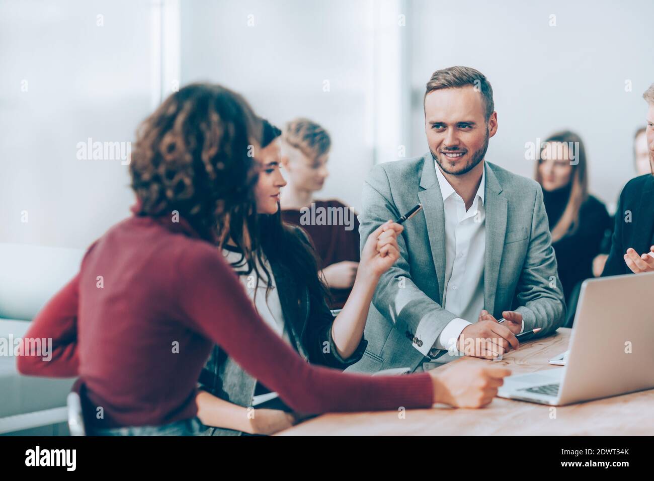 serious group of employees discussing important issues . photo with ...