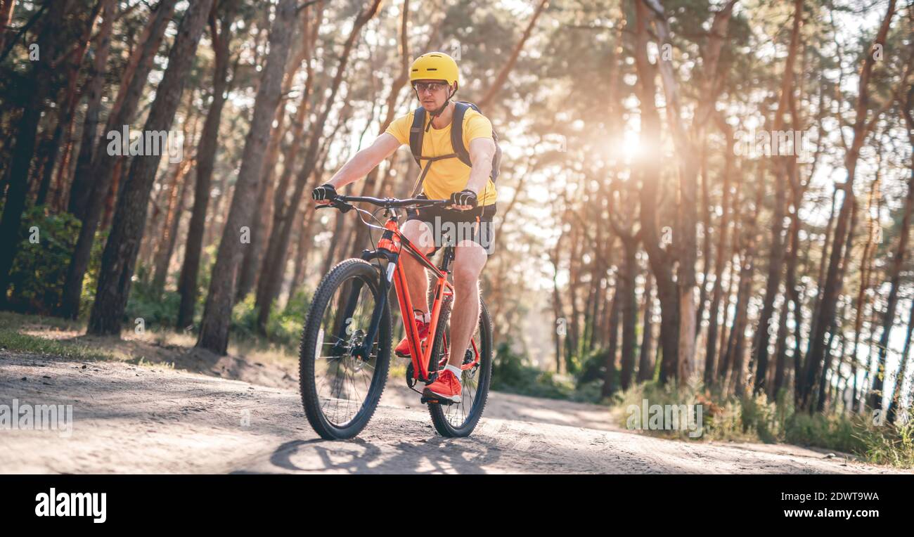 Man on bike cycling road hi-res stock photography and images - Alamy