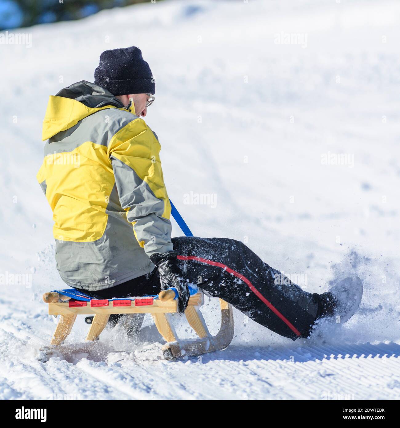 Funny afternoon in wintertime on sleigh with family Stock Photo - Alamy