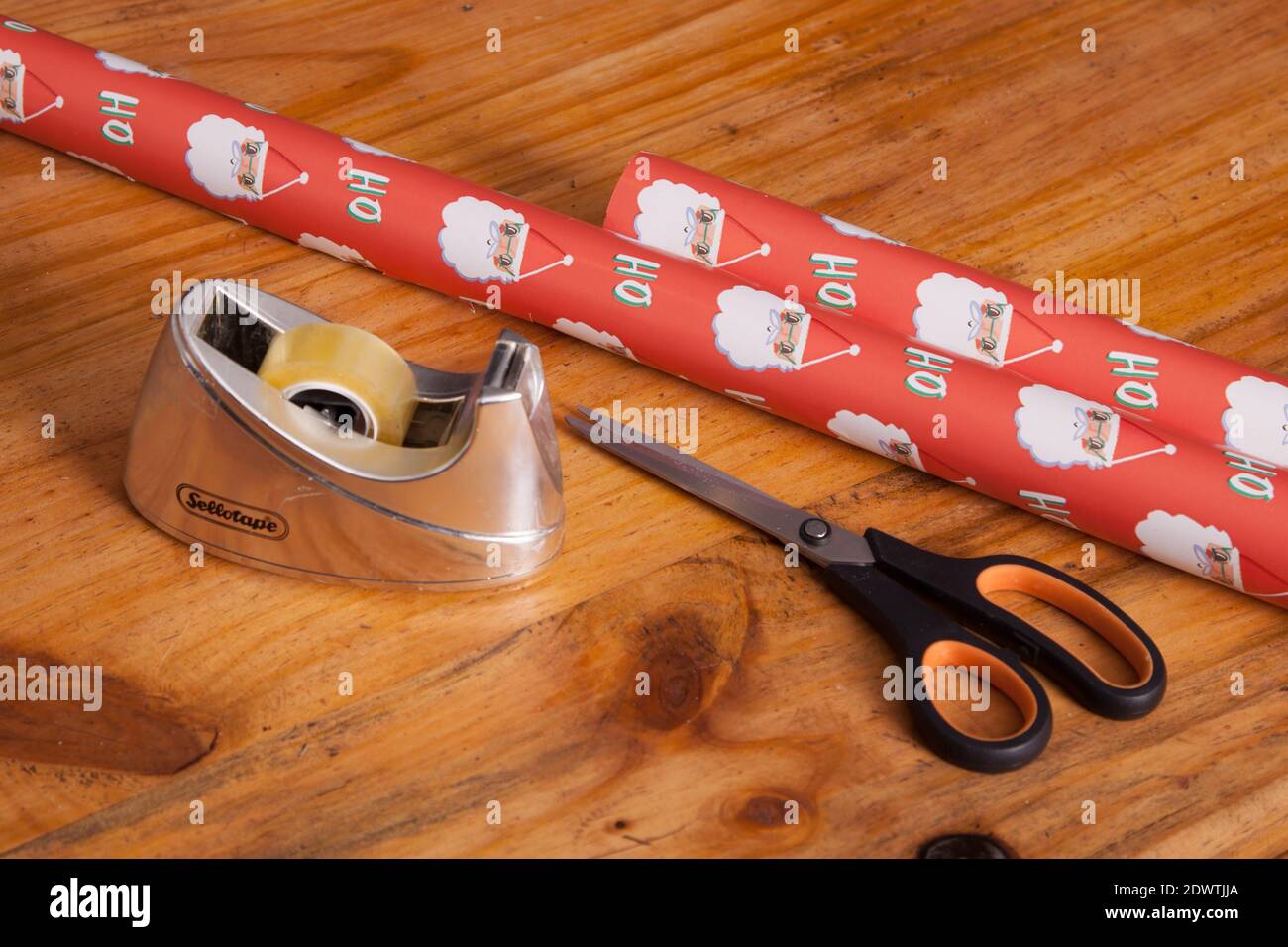 Christmas 2020 wrapping paper, scissors and Sellotape tape reel Stock ...