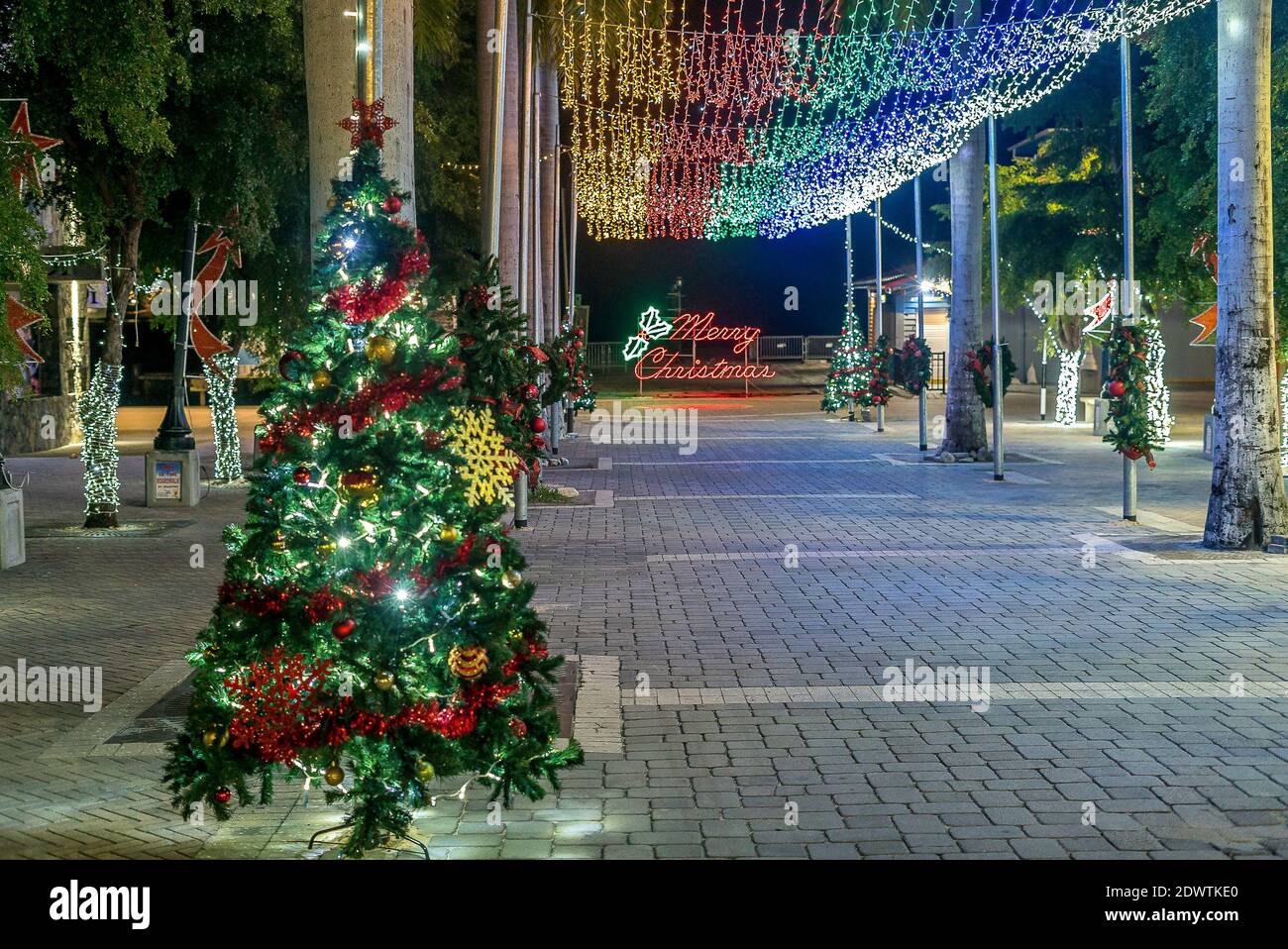 Colorful christmas light decorations on the eve of christmas day on the ...