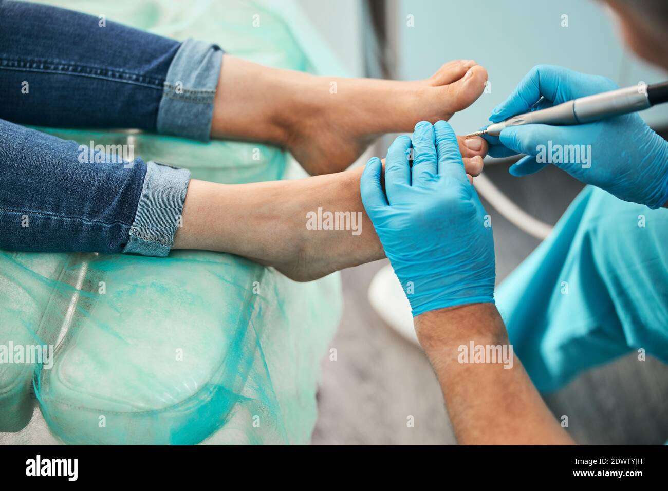 Professional treatment by the feet in medicine center Stock Photo - Alamy