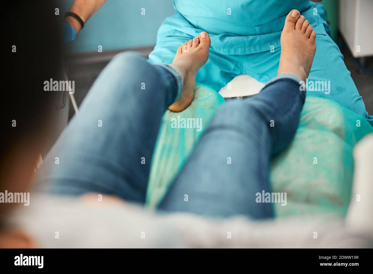 Beautiful patient visiting podiatry doctor in medical center Stock ...