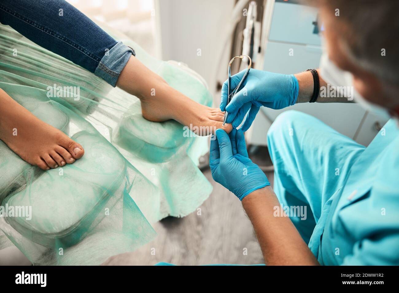 Female patient visiting podiatrist with pain on feet and toes Stock ...