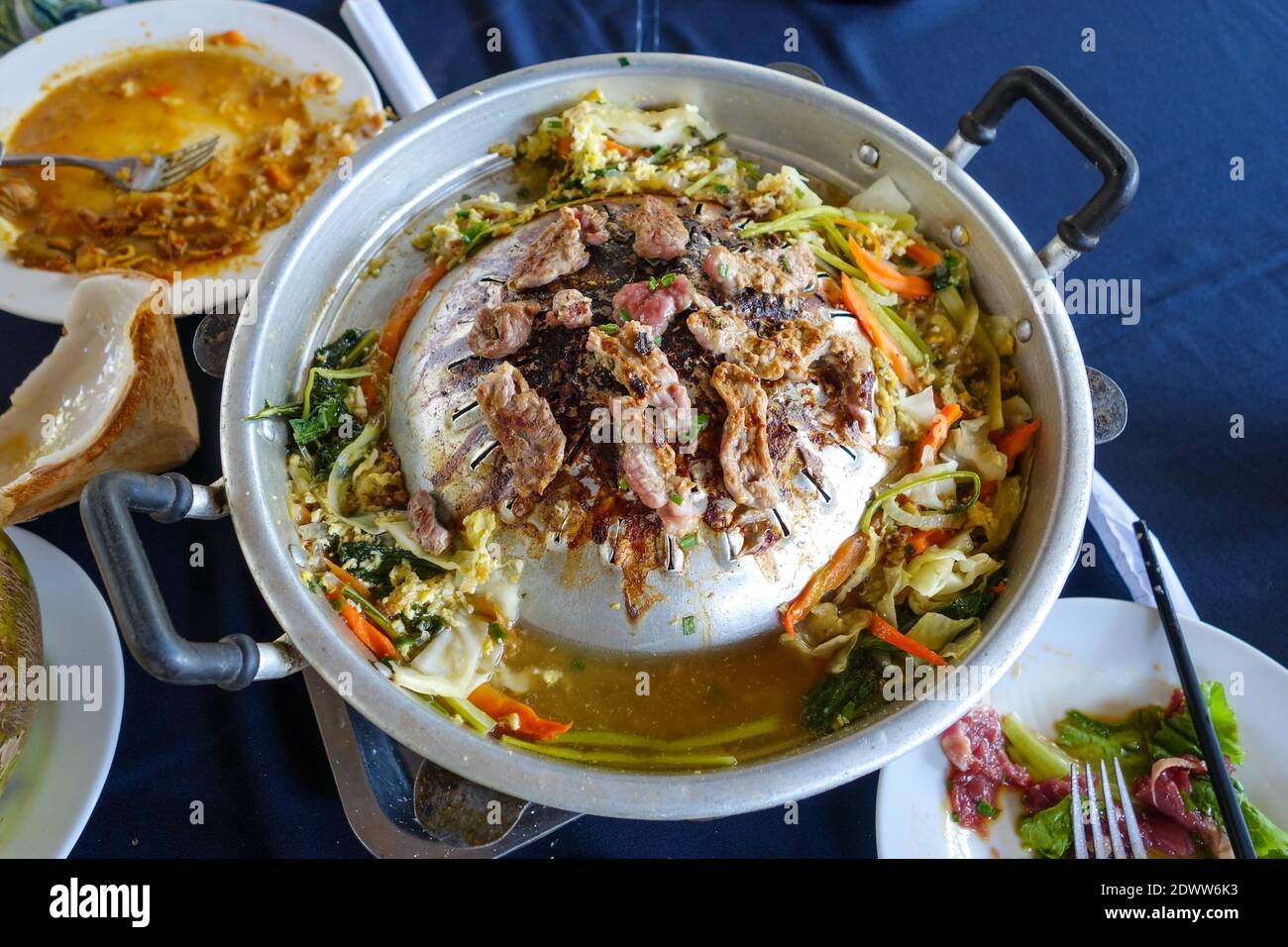 Phnom Pleung, “Fire Mountain” or "meat volcano", is a barbeque style ...