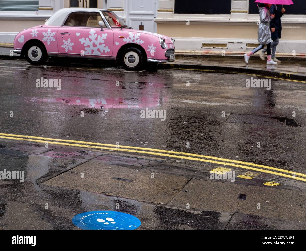 A pink car with white snow flakes parked in Covent Garden, London Stock ...