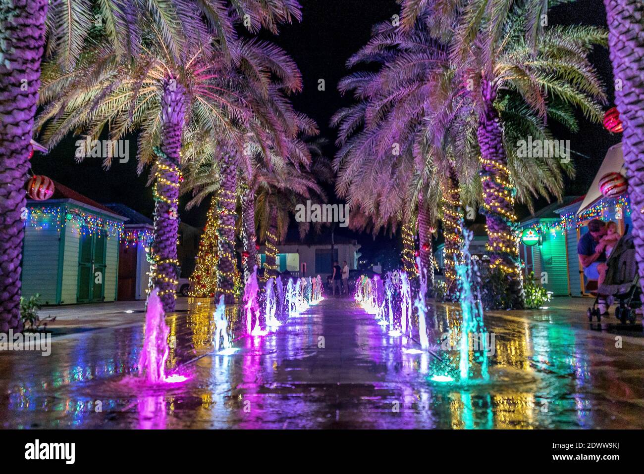 Colorful christmas light decorations on the eve of christmas day on the ...