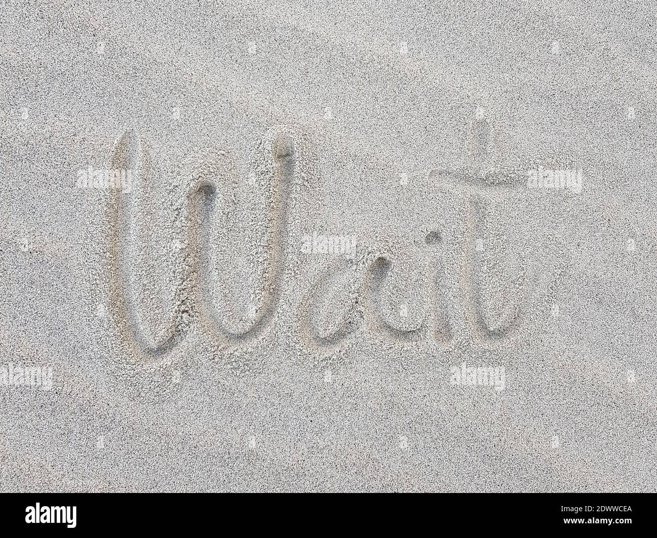 Alphabet writing on sand letter hi-res stock photography and images - Alamy