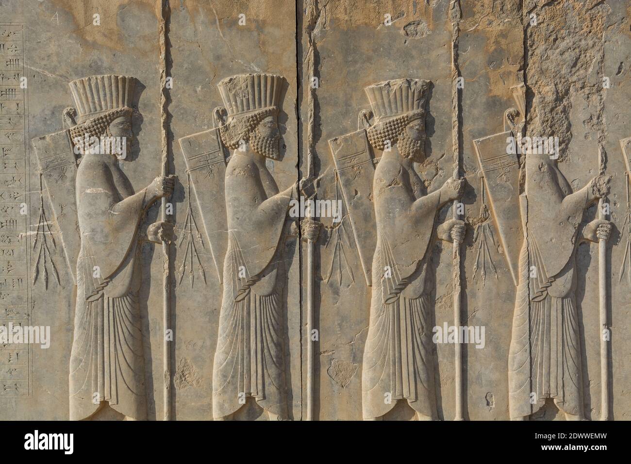 Bas relief on the wall of ruins in the Persepolis in Shiraz, Iran. The ...