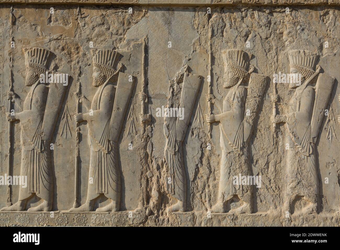 Bas relief on the wall of ruins in the Persepolis in Shiraz, Iran. The ...