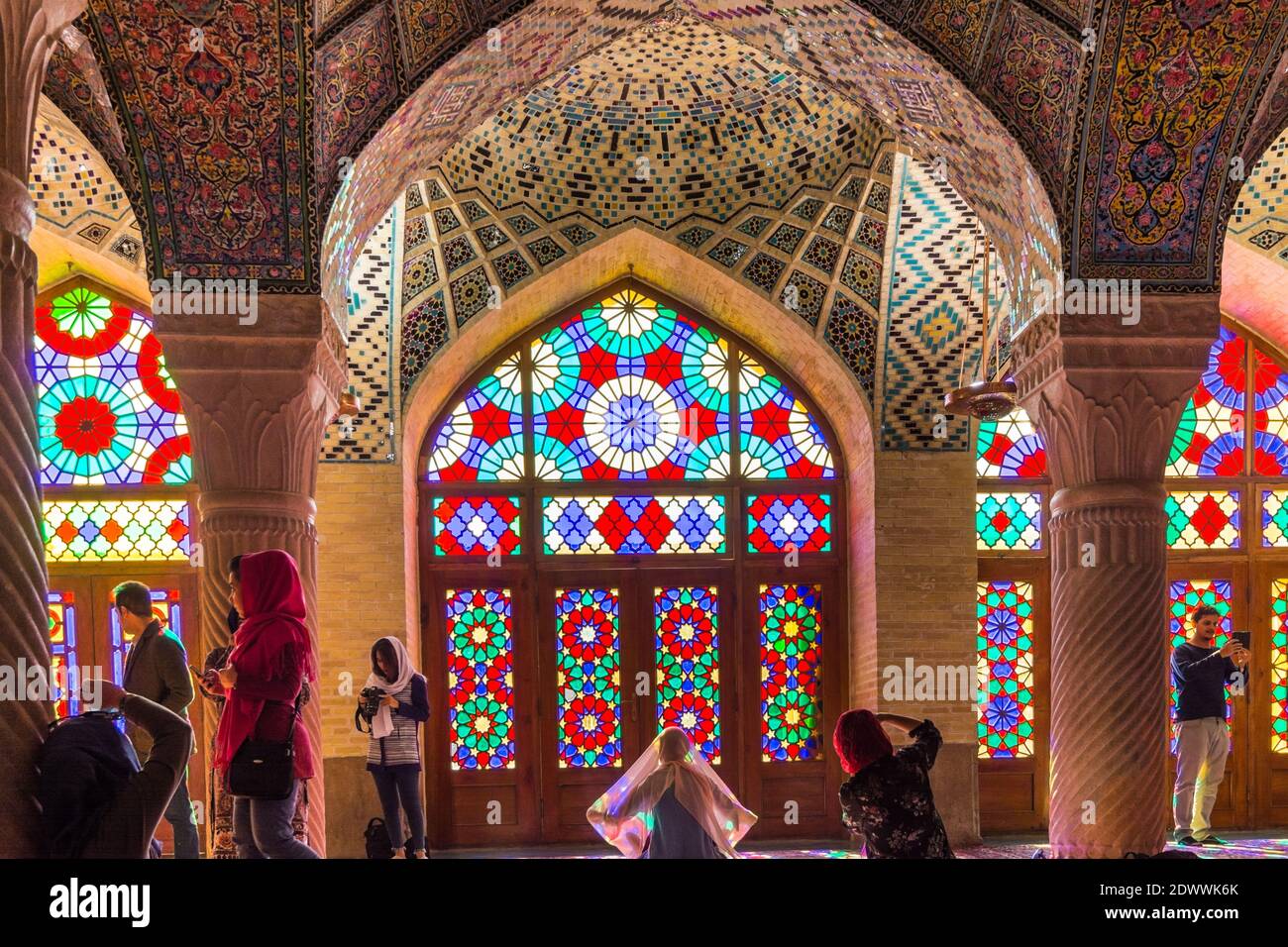 Lots of tourists taking photos in the interior of Nasir Al-Mulk Mosque ...