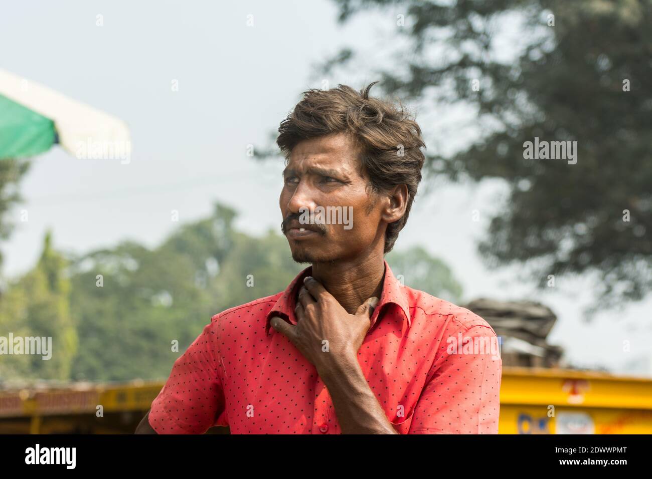 Portrait of a poor Indian man with mustache Stock Photo - Alamy