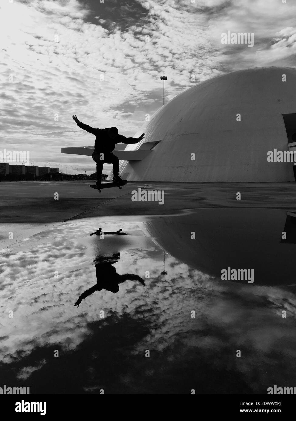 Man jumping puddle hi-res stock photography and images - Alamy