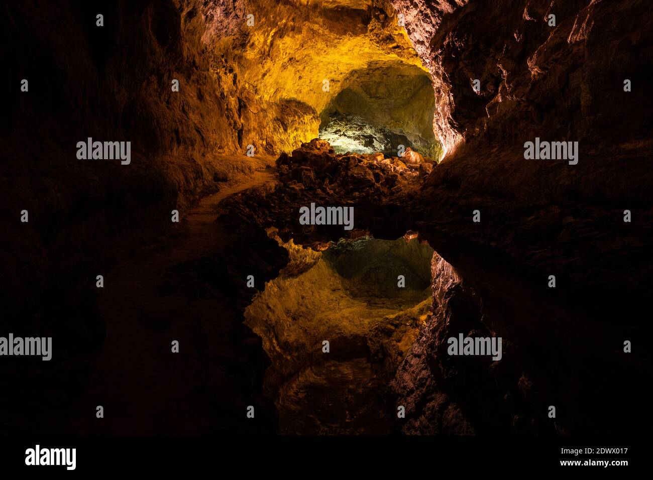 Optical reflection effect on cave lava tube illuminated in Canary ...