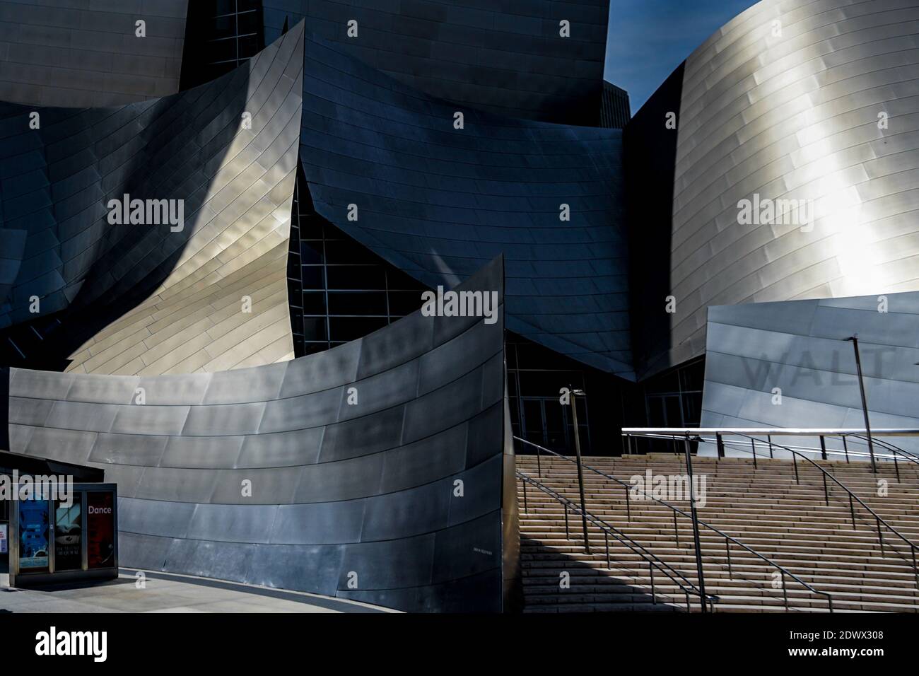 Modern city building with metal skin, curved forms and stairway Stock ...