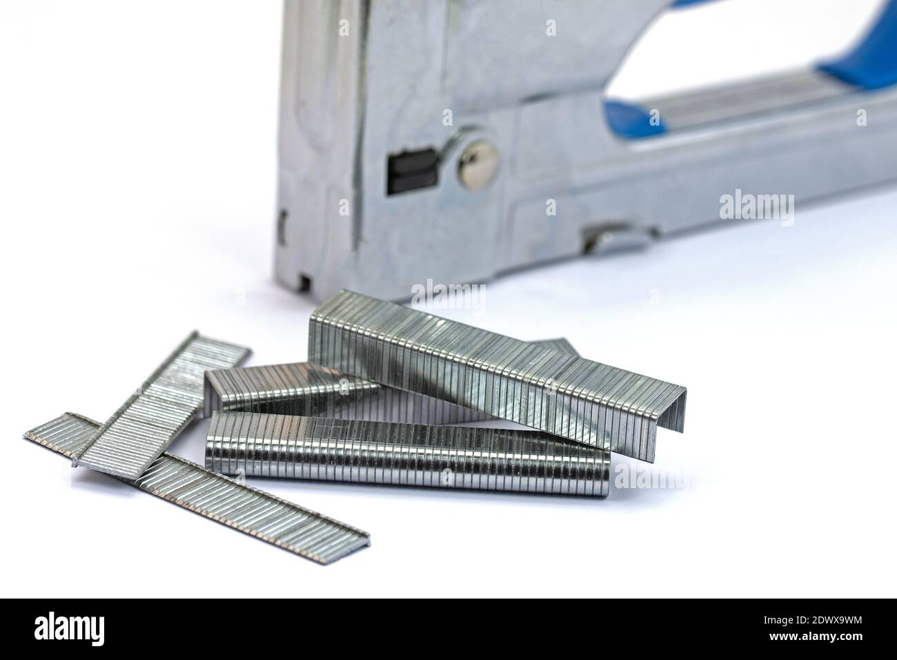 Clamps for hand tacker against a white background Stock Photo - Alamy