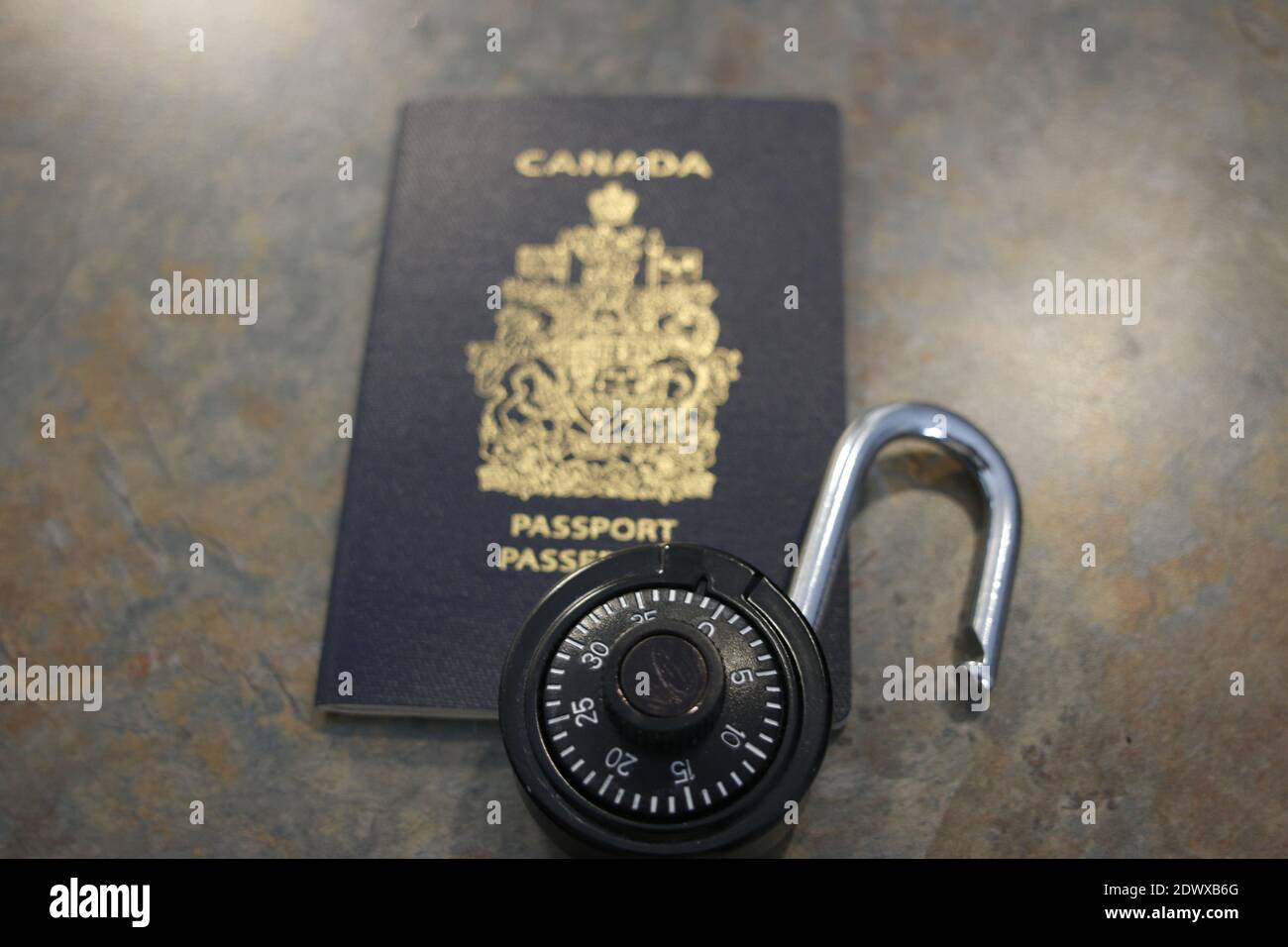 Immigration Canada application form with maple leaf. lock and passport ...