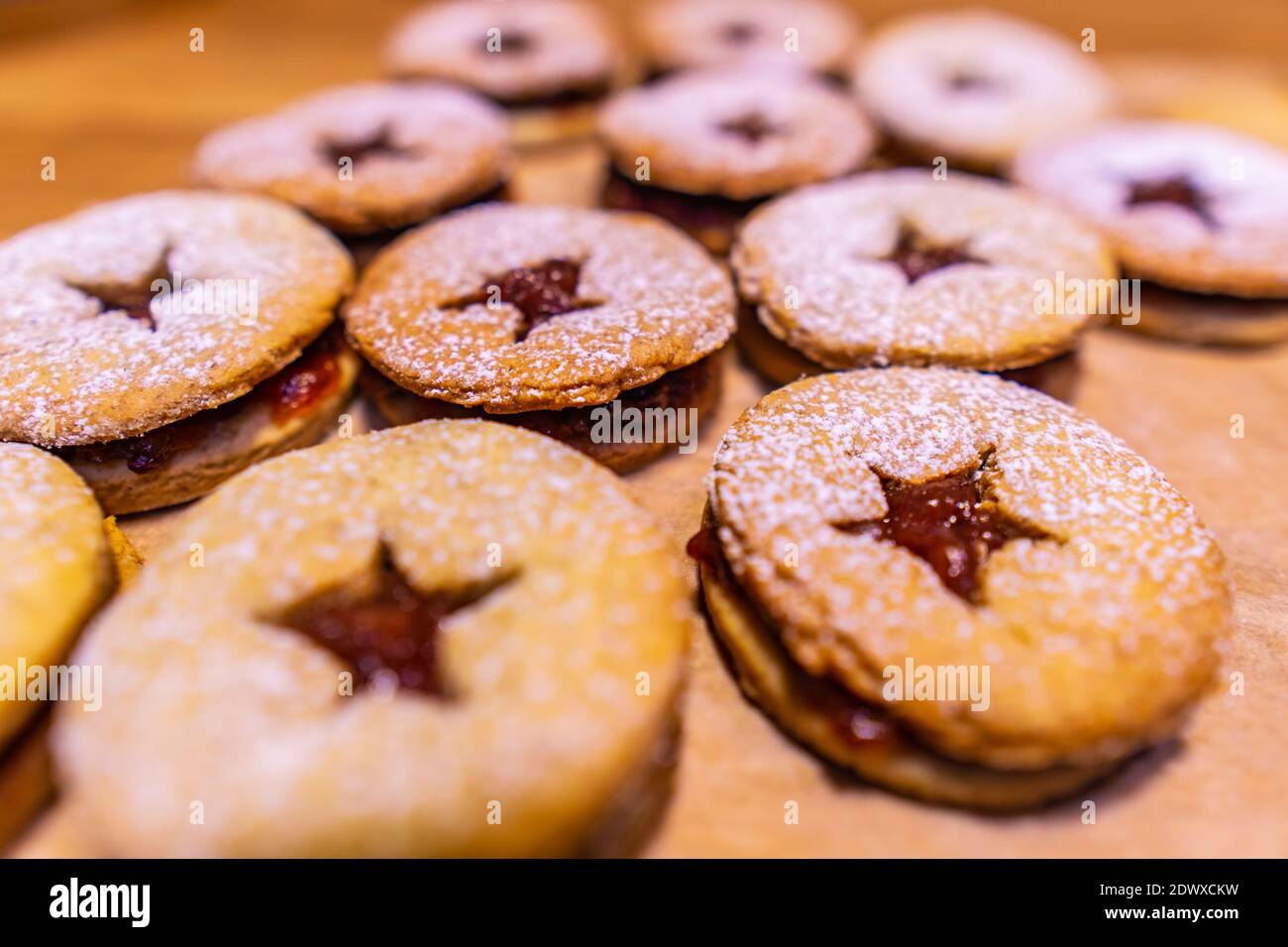 Jelly cookies star with red jam homemade Stock Photo - Alamy