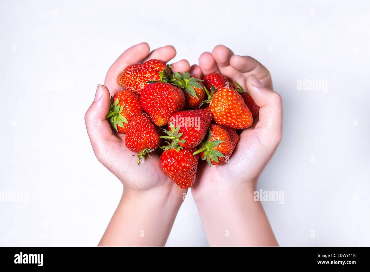 Handful Of Strawberries High Resolution Stock Photography and Images ...
