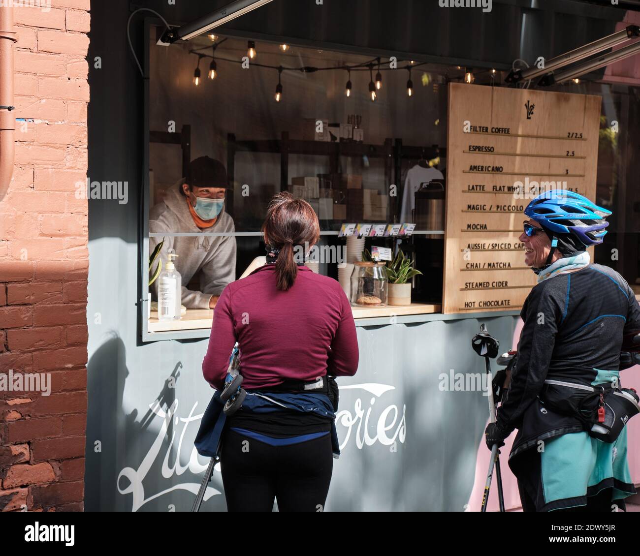 Woman ordering coffee shop hi-res stock photography and images - Alamy