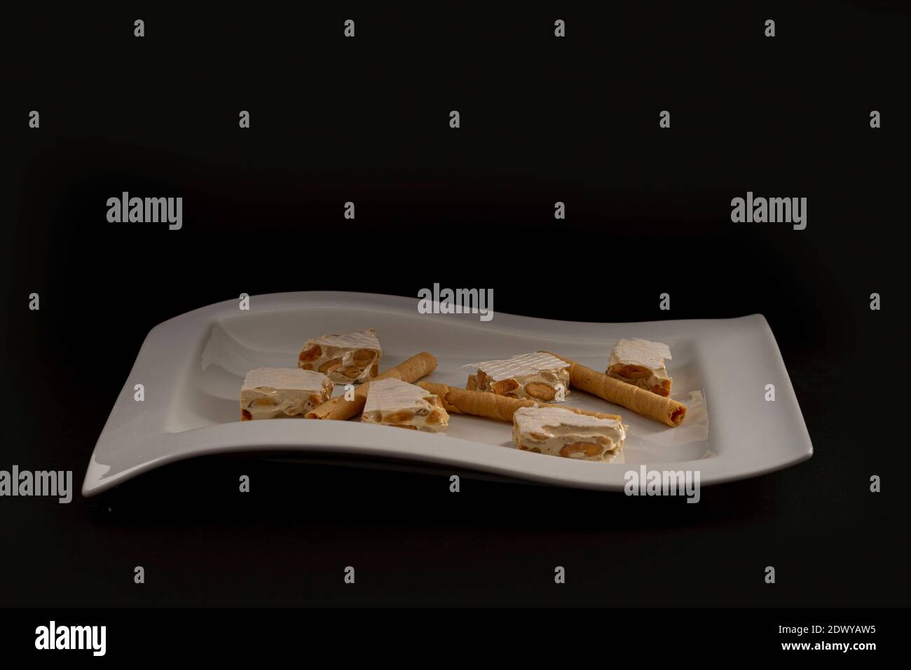 Assortment of Spanish Christmas sweets made up of Alicante nougat and ...