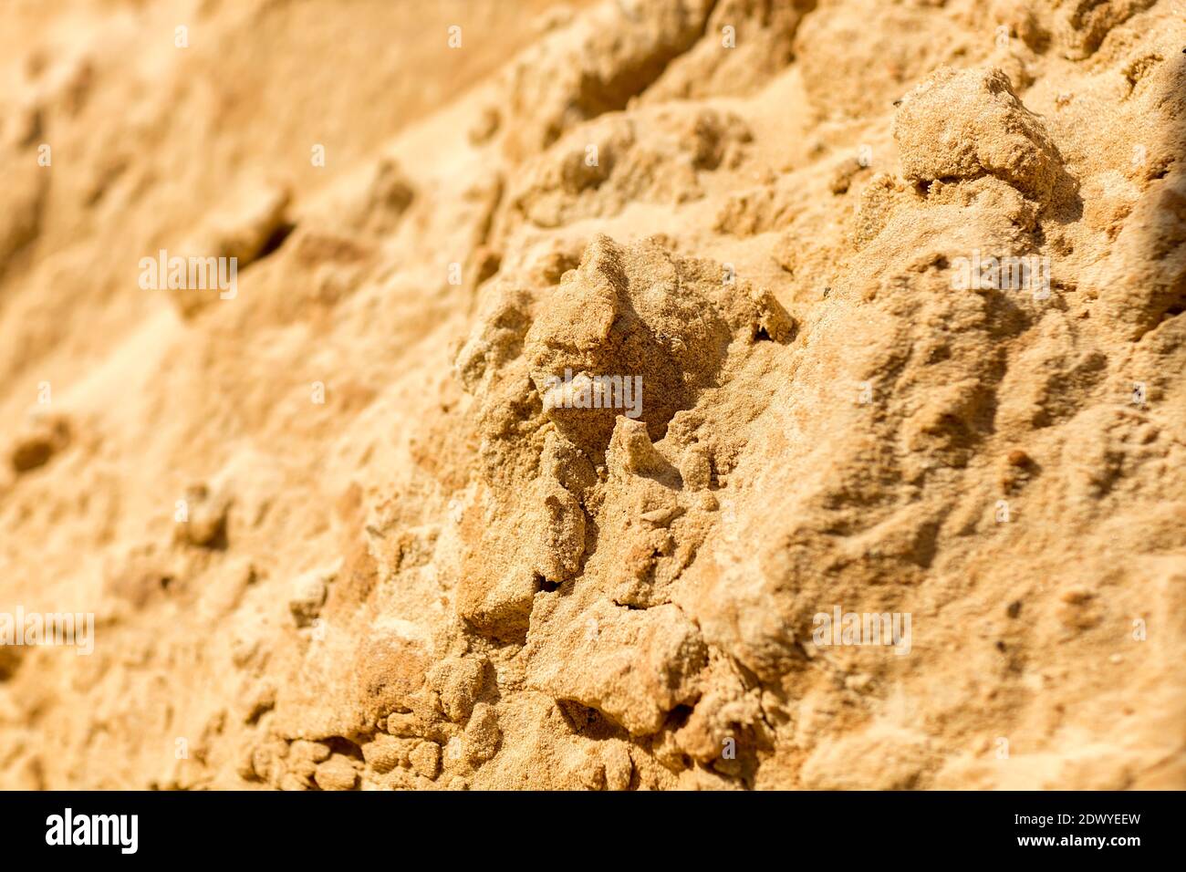 Texture of construction yellow sand Stock Photo - Alamy