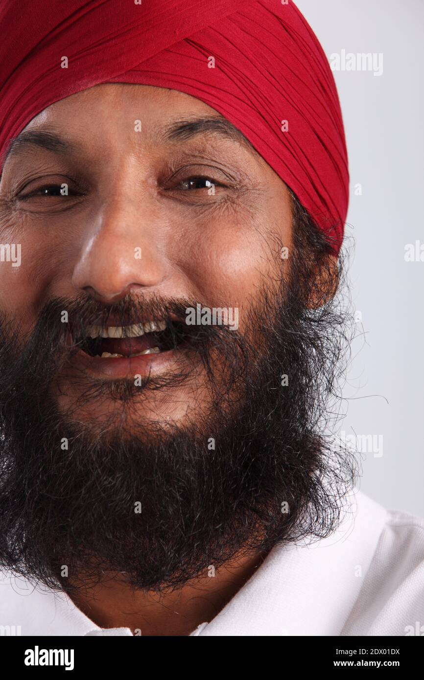 Red punjabi turban hi-res stock photography and images - Alamy