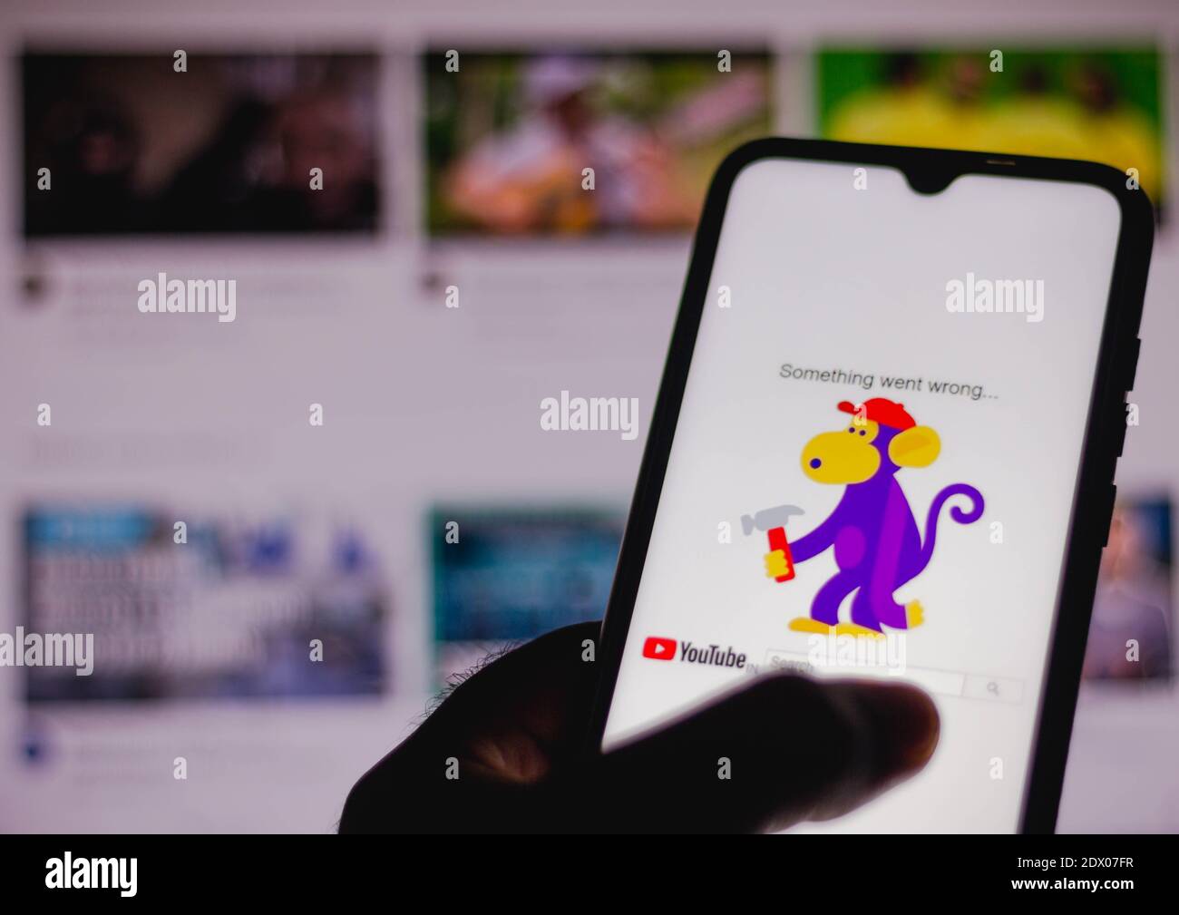 In this photo illustration a Youtube logo seen displayed on a ...