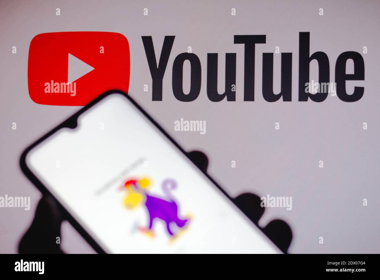 In this photo illustration a Youtube logo seen displayed on a ...