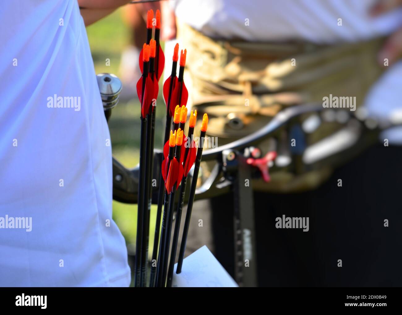 Two men holding arrows hi-res stock photography and images - Alamy