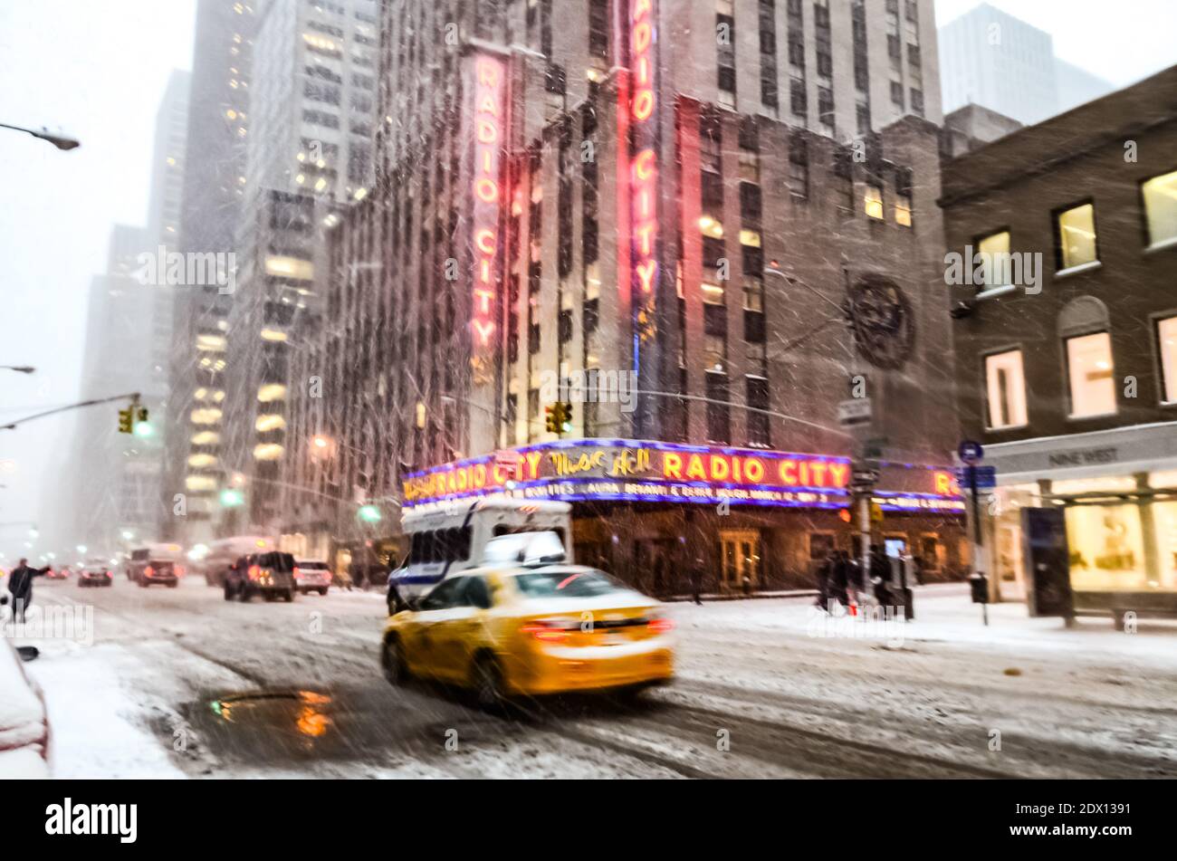 Winter snowstorm blizzard in New York City with heavy snow fall, cars ...