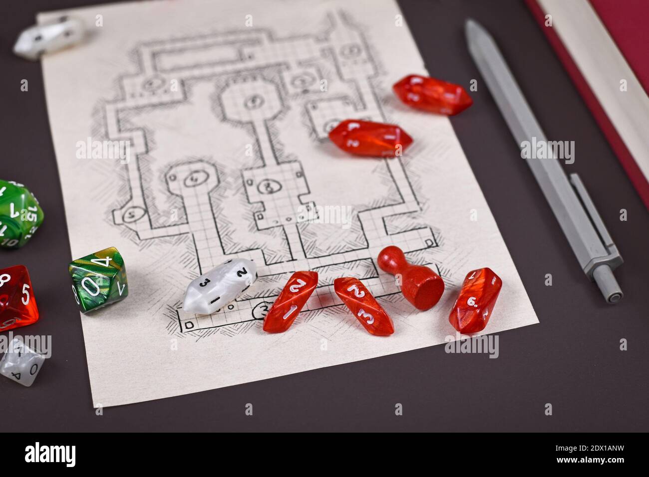 Roleplaying game dices on hand drawn dungeon adventure map. Concept for ...