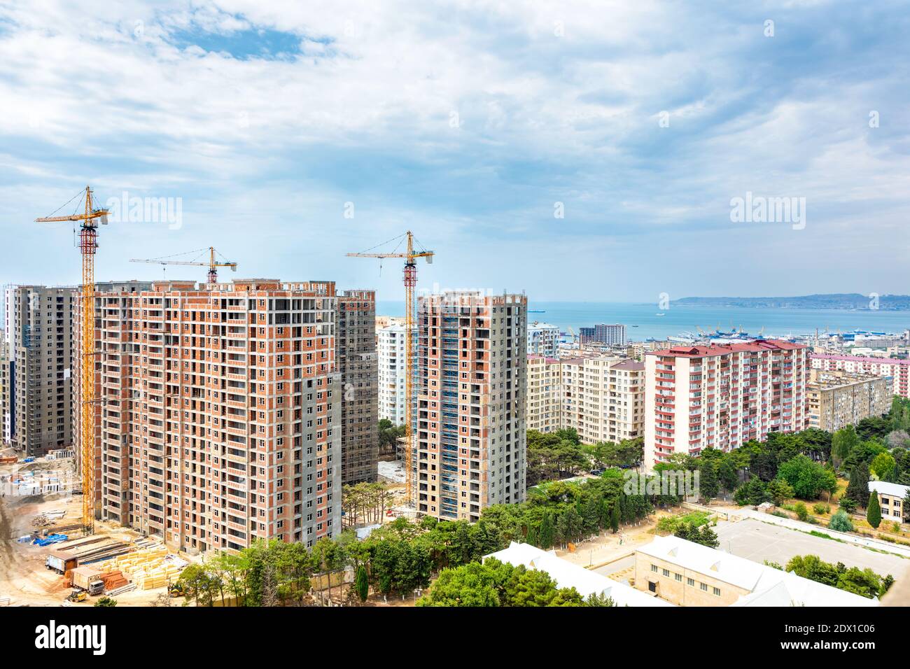 High buildings scaffold at the construction site, city view Stock Photo ...