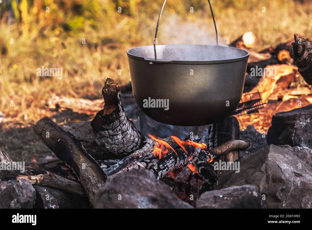 Boiling pot on firewood hi-res stock photography and images - Alamy