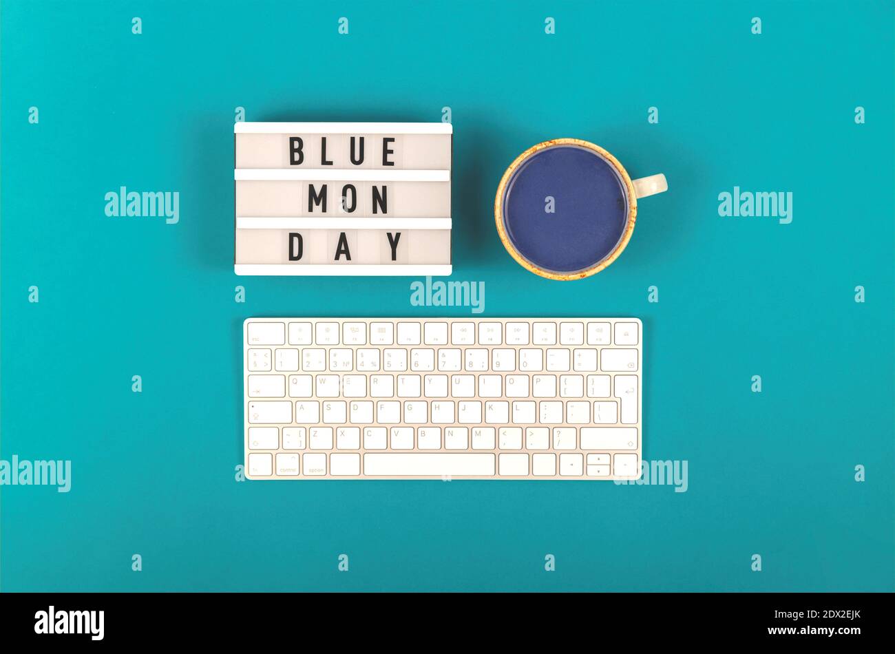 Sad blue Monday lettering on blue workplace Stock Photo - Alamy