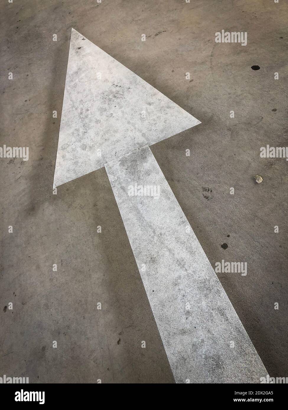 Directional arrow on ground hi-res stock photography and images - Alamy