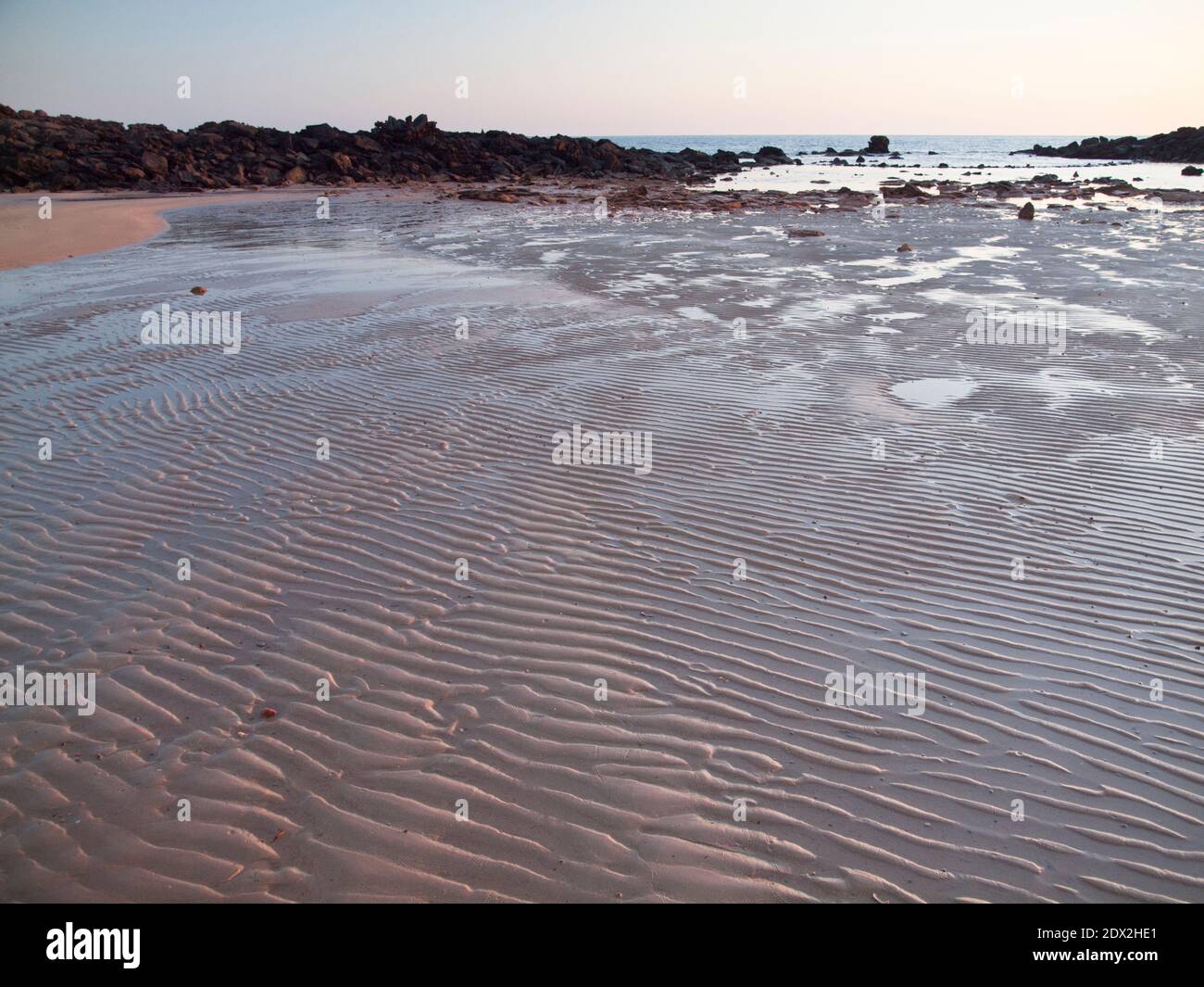 Sand patterns at low tide on the beach at Middle Lagoon, Dampier ...