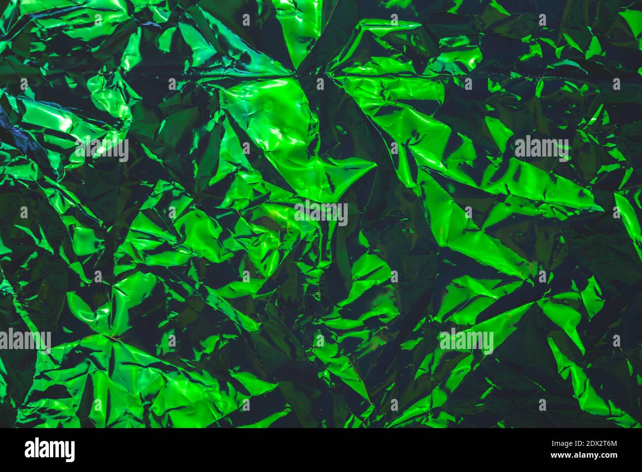 Green crumpled textured holographic trendy dark background Stock Photo ...