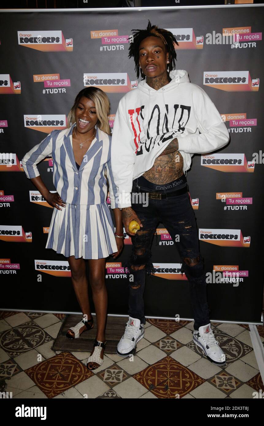 Azealia Banks and Wiz Khalifa attending the 'Orange RockCorps Live 2014 ...