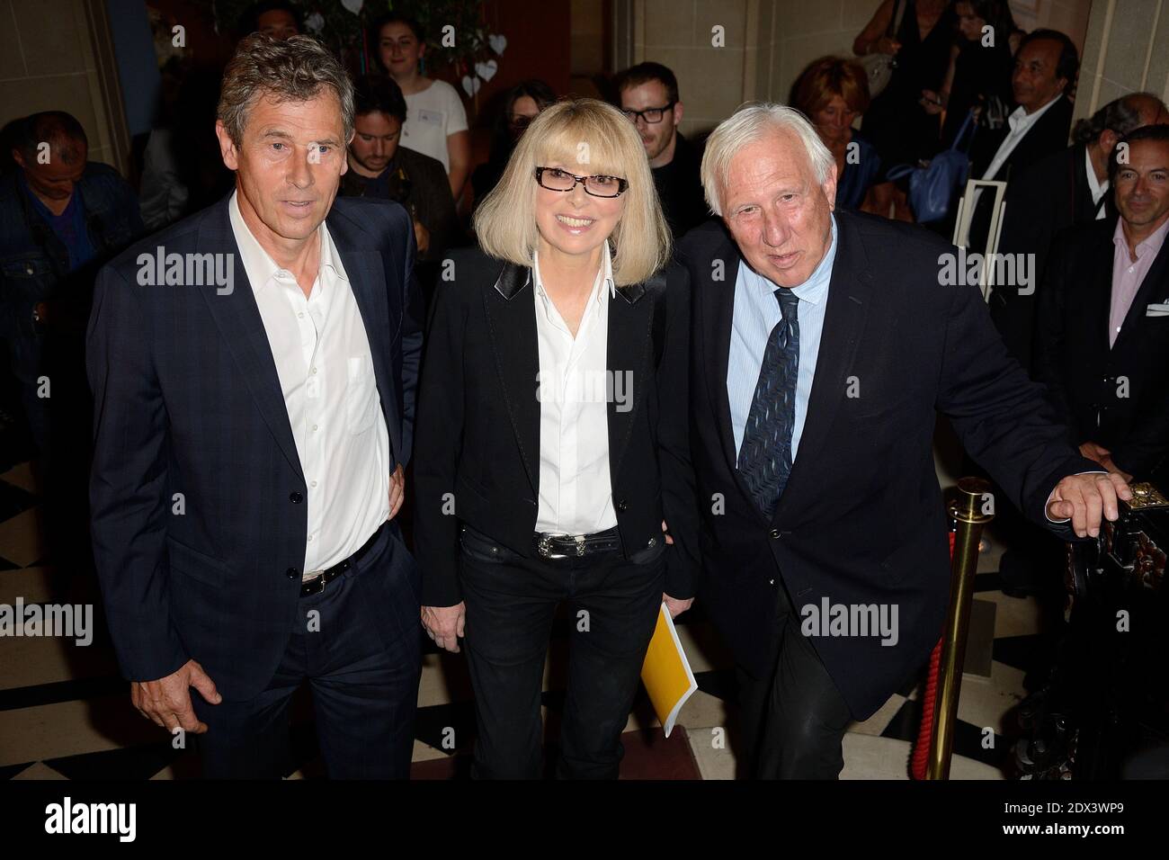 Mireille Darc and Alain Deloche attending a auction sale for 'Coeur de ...