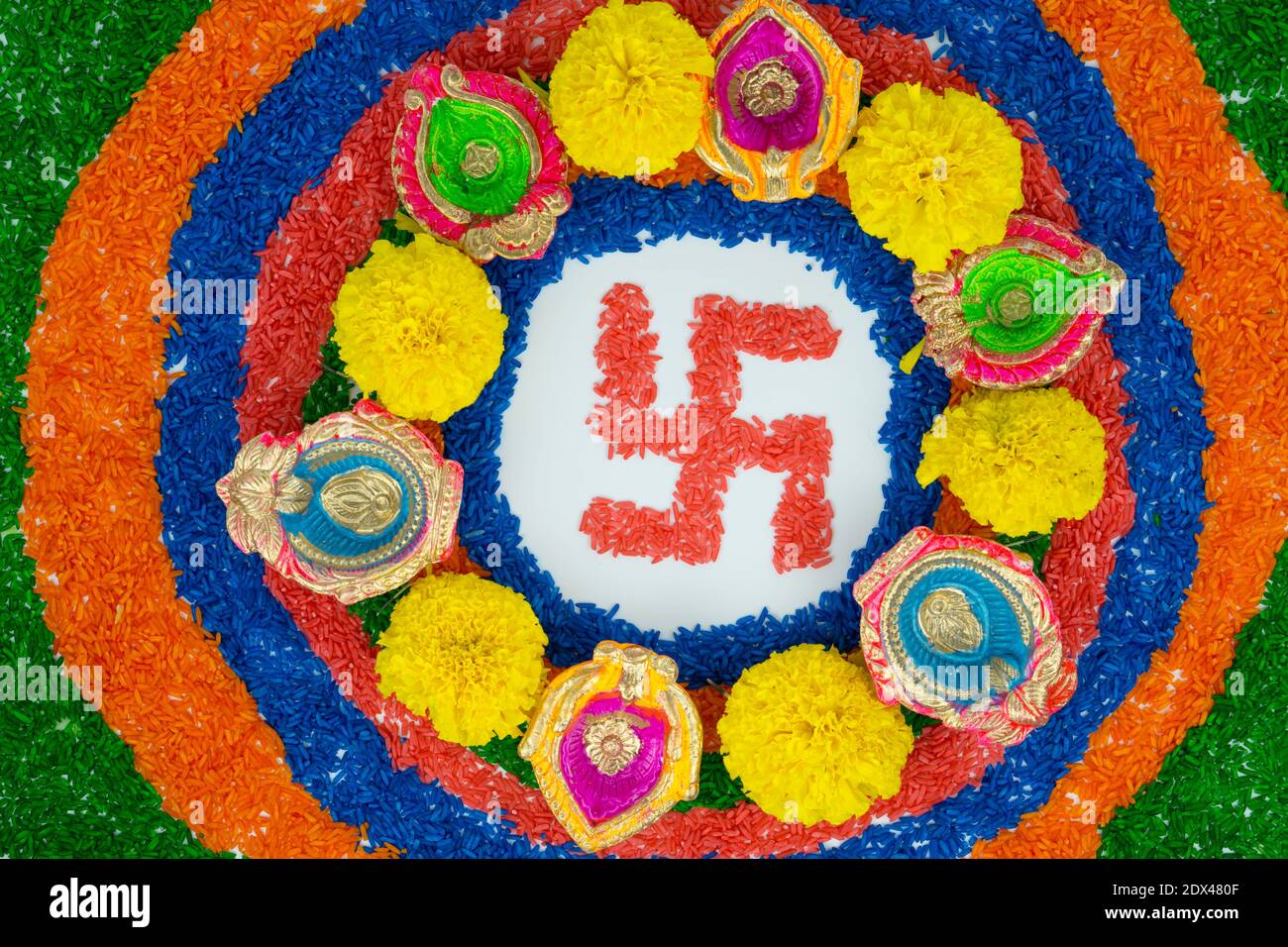 Rice rangoli hi-res stock photography and images - Alamy