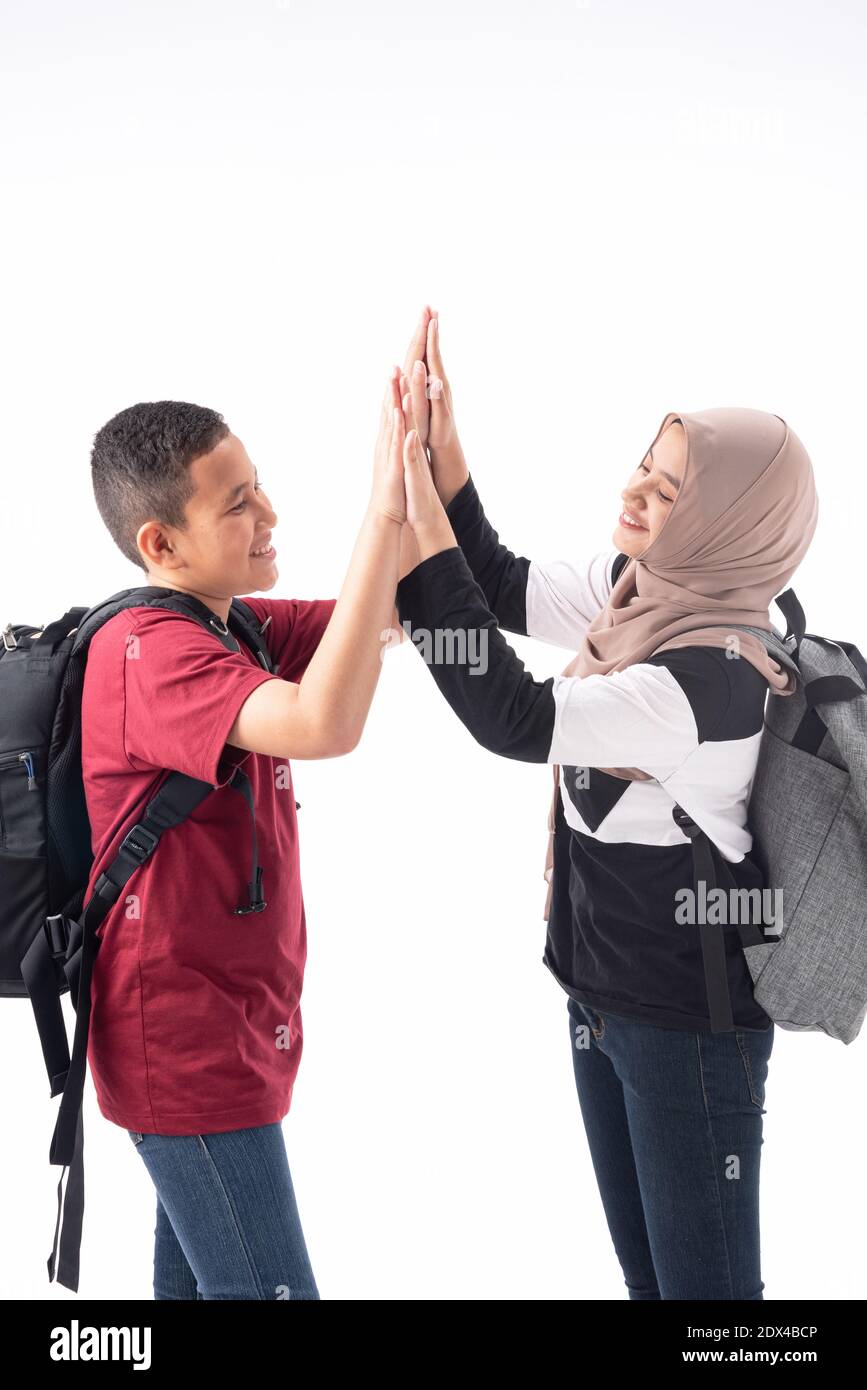 Boys Giving High Five High Resolution Stock Photography and Images - Alamy