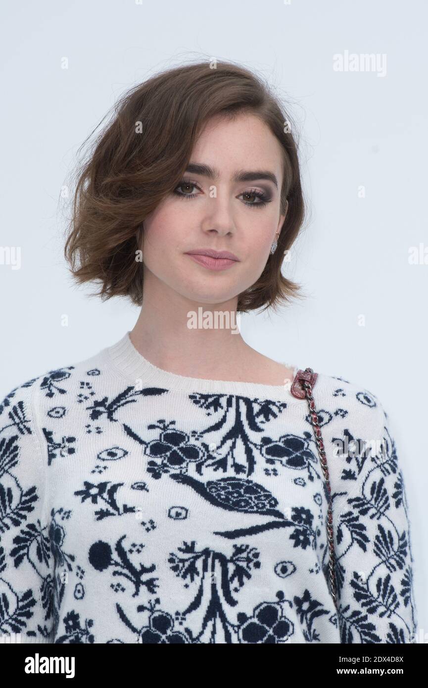 Lily Collins attends the Chanel show as part of Paris Fashion Week ...