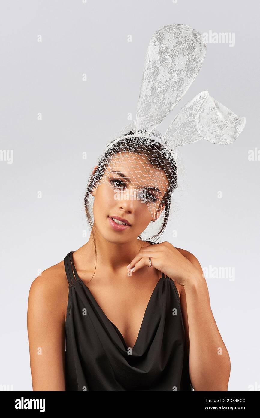 Portrait Of Girl Wearing Headband Against White Background Stock Photo ...