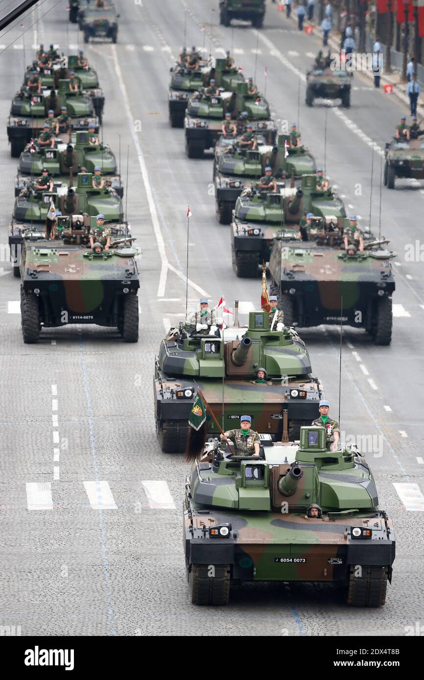 French Army Leclerc tanks of the 1st Regiment of Chasseurs drive down ...