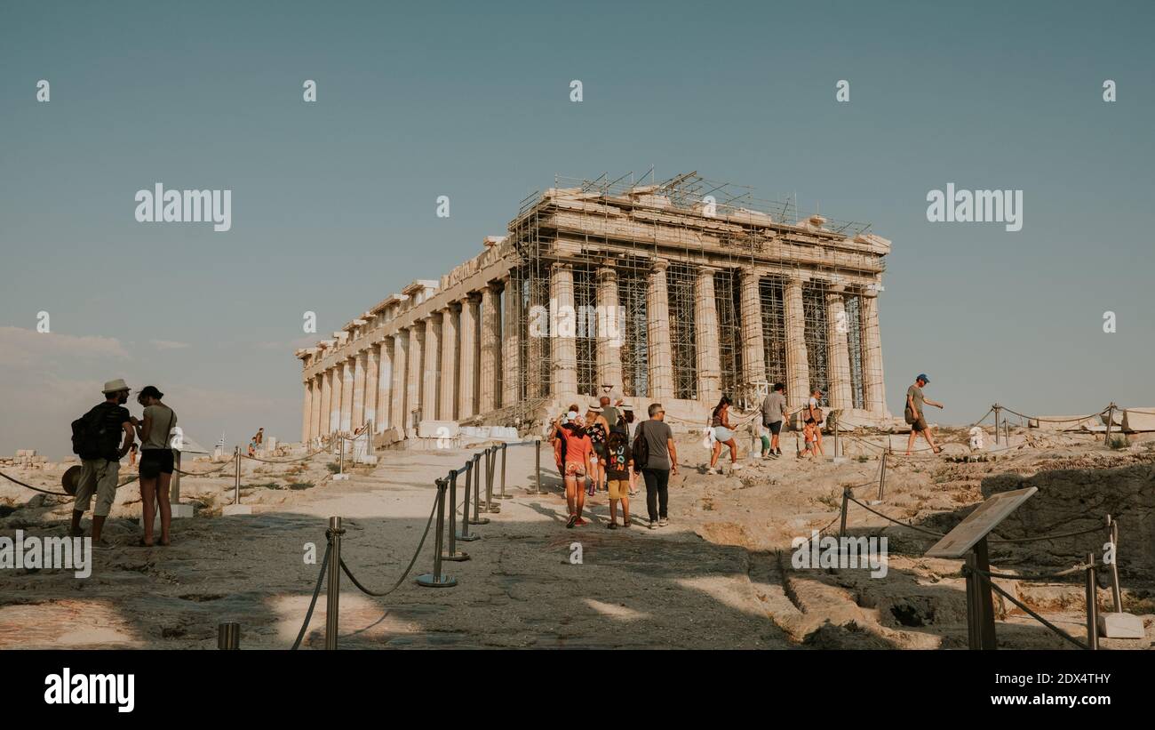 Tourists visiting ancient Parthenon Temple Architecture during ...