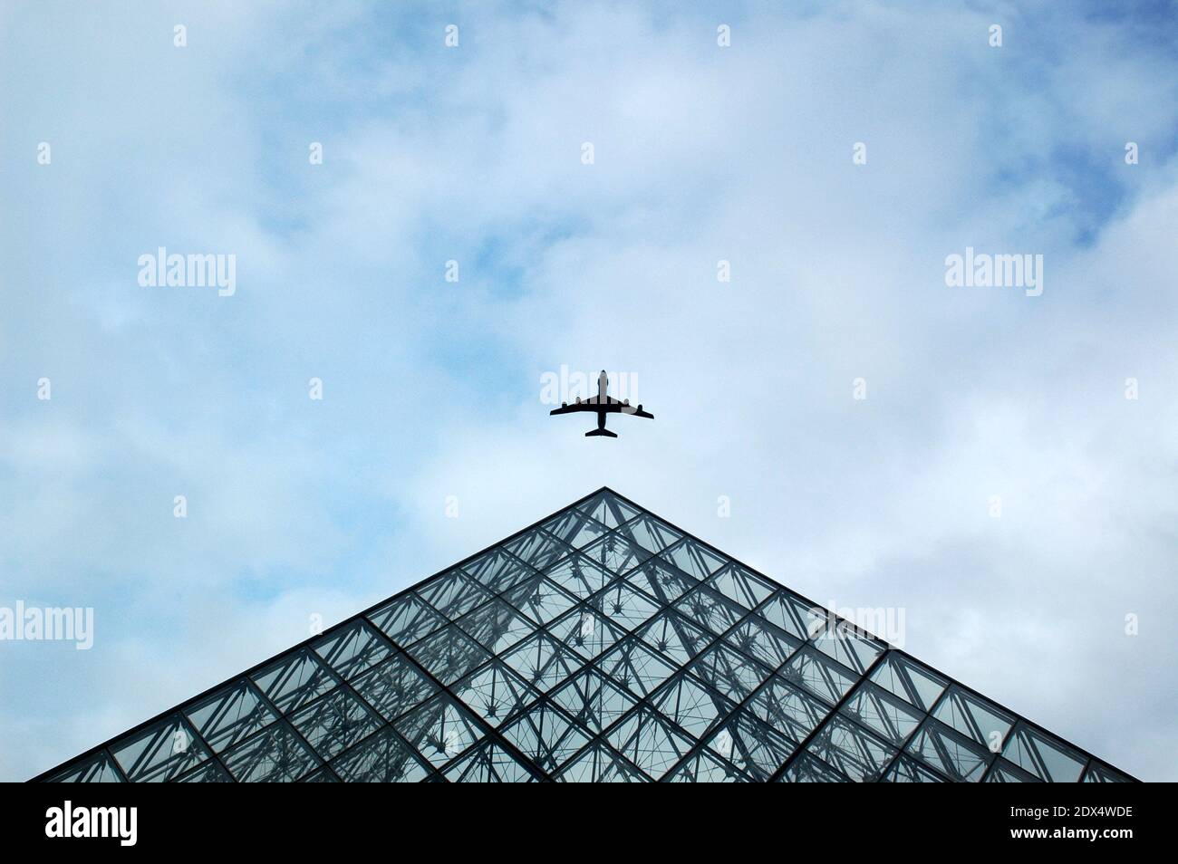 Planes are flying over Le Louvre Pyramide prior to the annual Bastille ...
