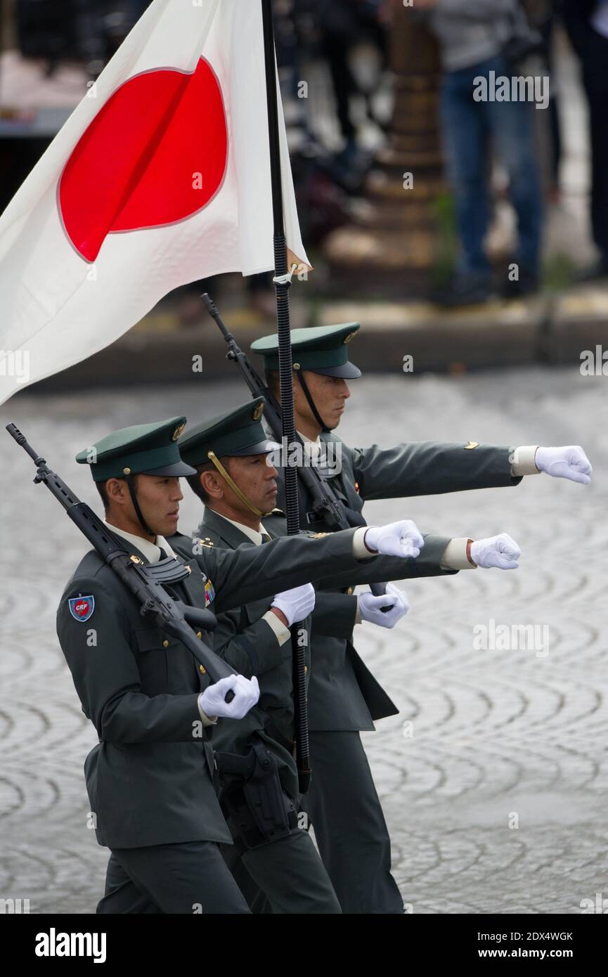 Japanese soldiers parade on the Champs-Elysees during the annual ...