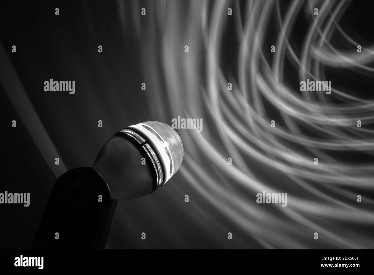 Long exposure photography of light traces projected on the screen (B/W ...